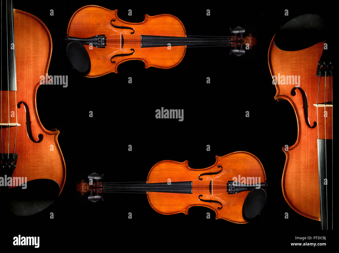 Violin orchestra musical instruments on black background Stock Photo ...