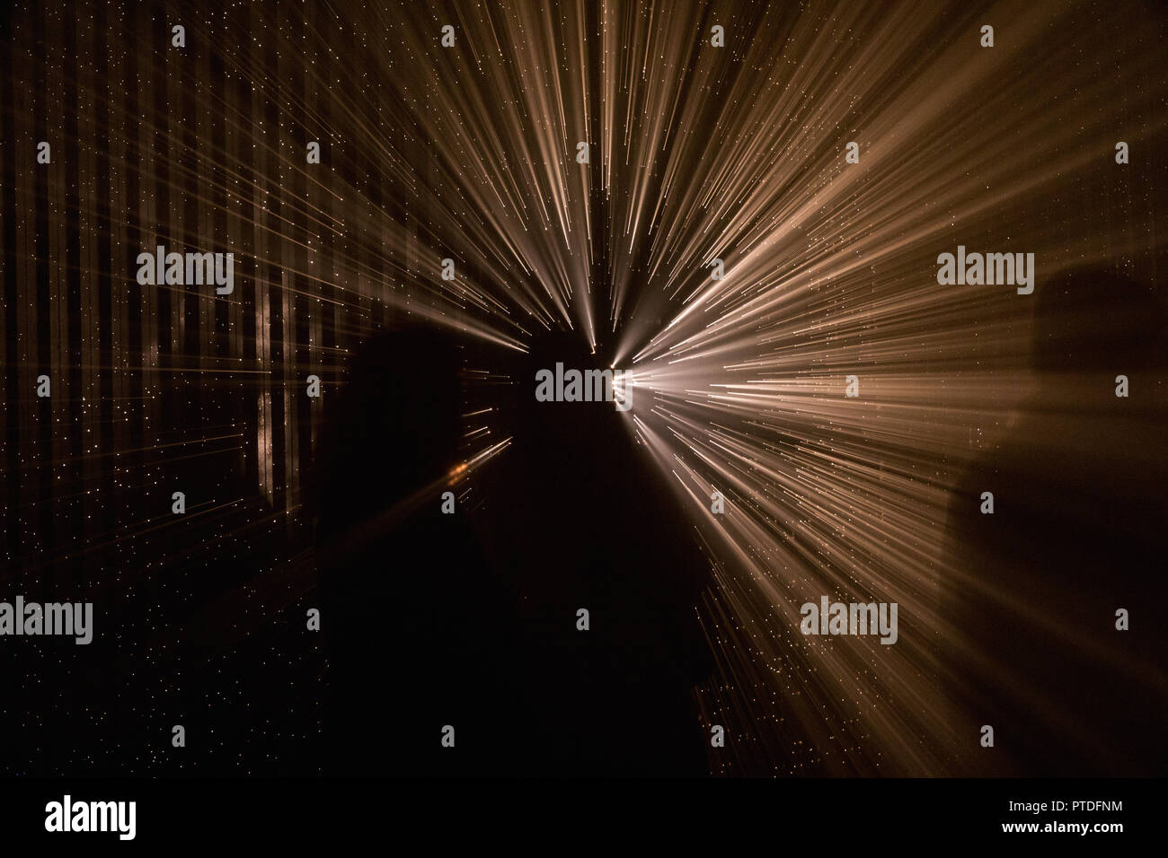 Light abstract projection. Colorful light rays. The silhouette of ...