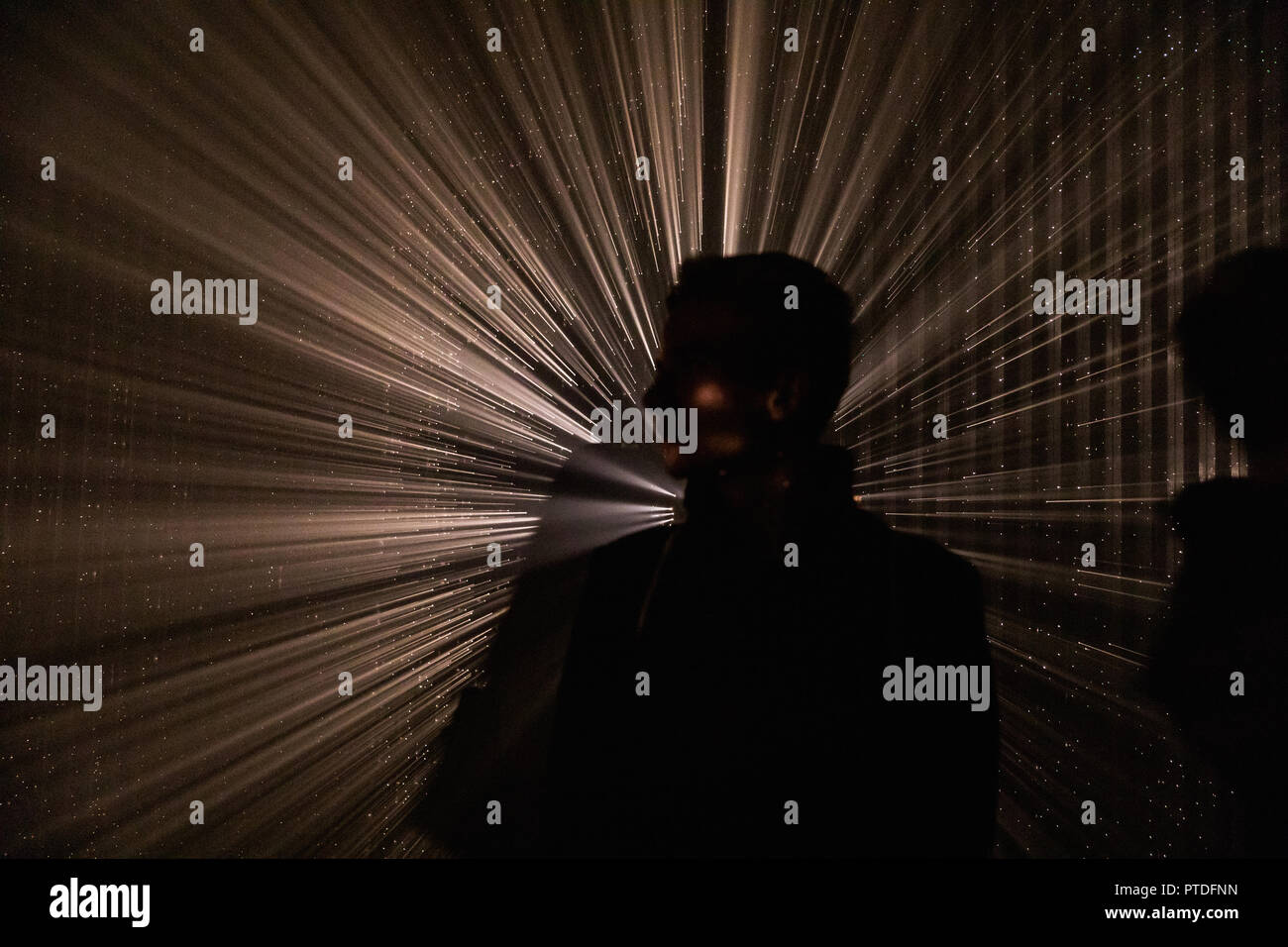 Light abstract projection. Colorful light rays. The silhouette of ...