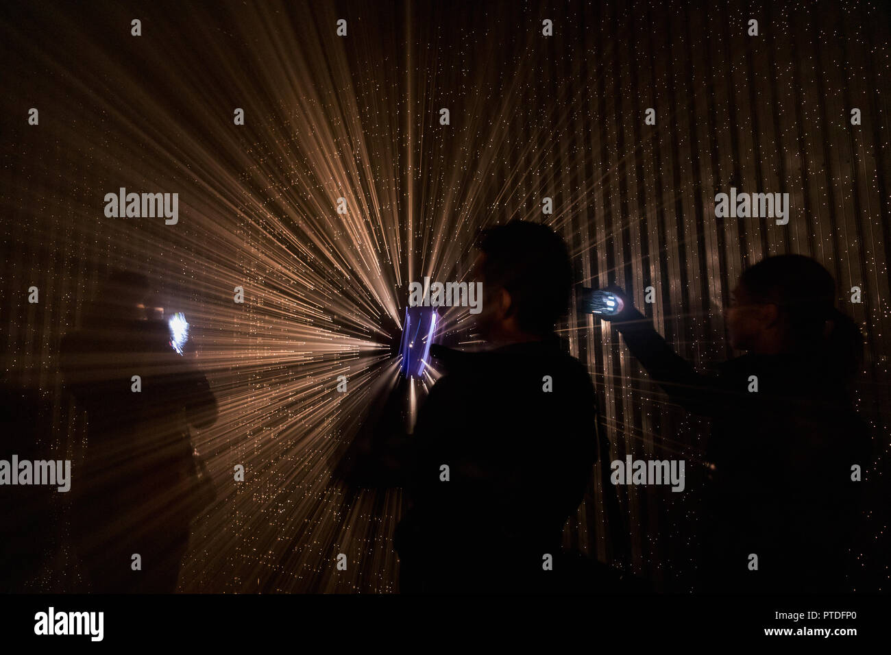 Light abstract projection. Colorful light rays. The silhouette of ...