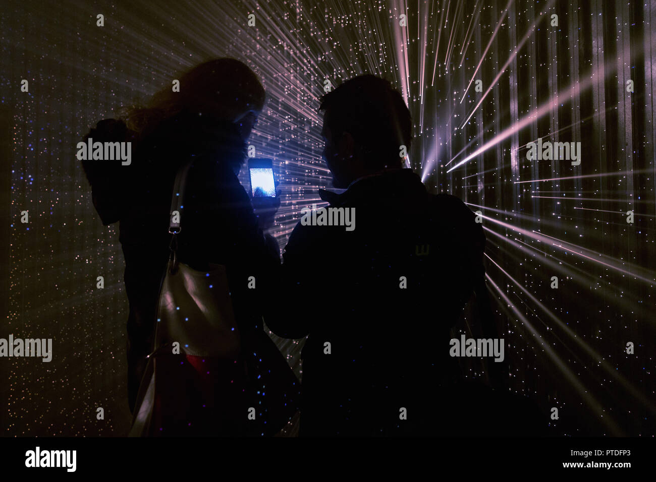 Light abstract projection. Colorful light rays. The silhouette of ...