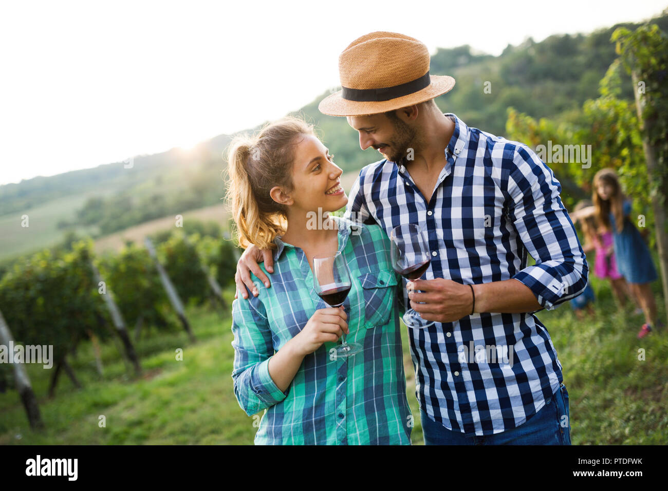 Picture of people tasting red wine in vineyard Stock Photo - Alamy