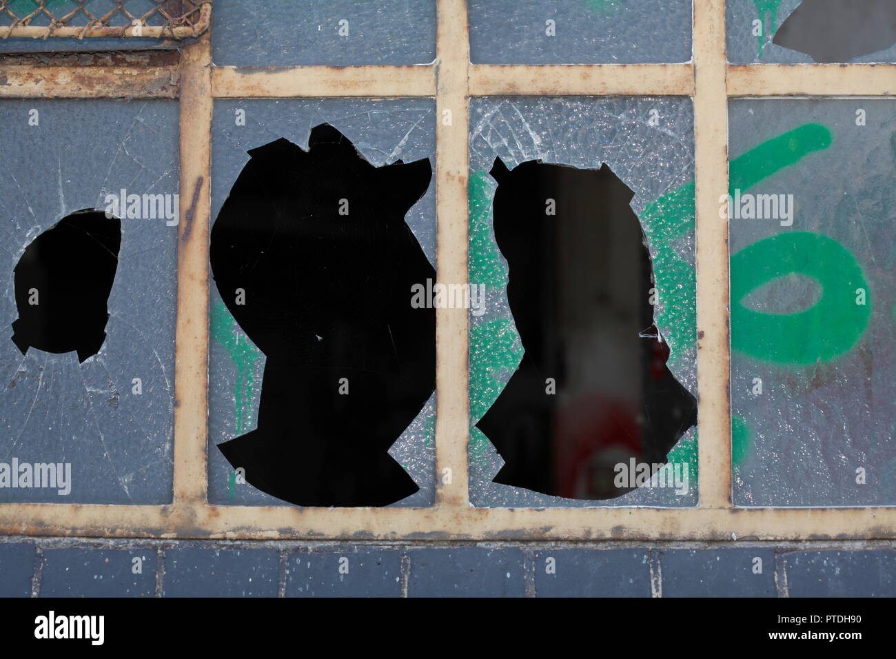 Fragmented glass, old broken window Stock Photo - Alamy