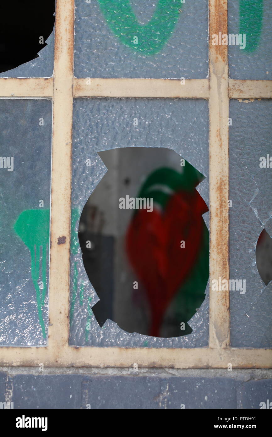 Fragmented glass, old broken window Stock Photo - Alamy
