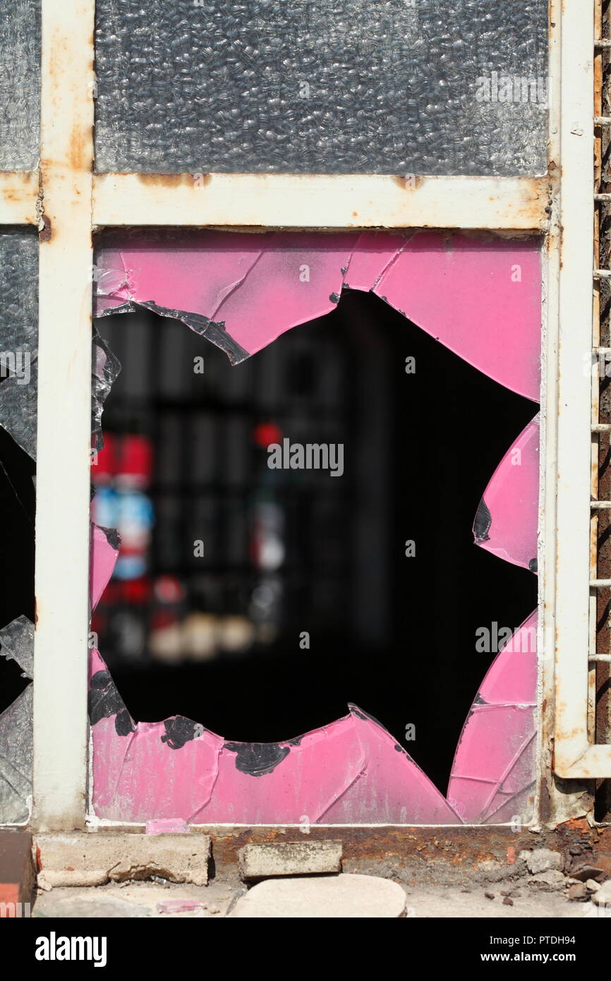 Fragmented glass, old broken window Stock Photo - Alamy