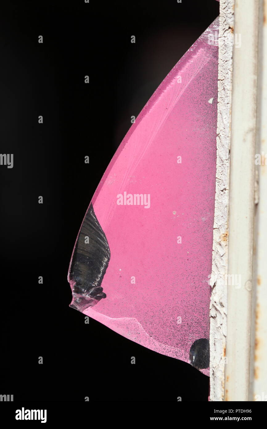 Fragmented glass, old broken window Stock Photo - Alamy