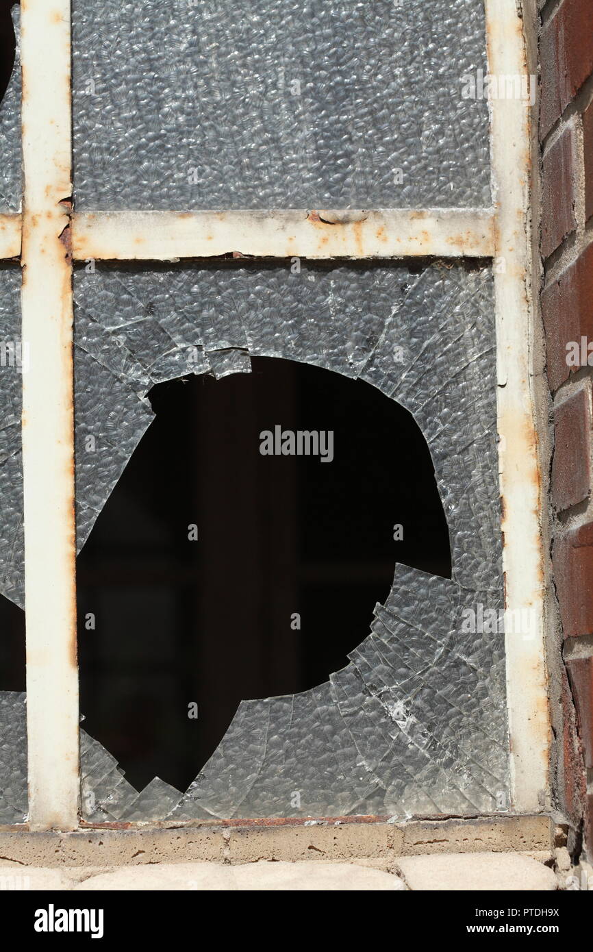 Fragmented glass, old broken window Stock Photo - Alamy