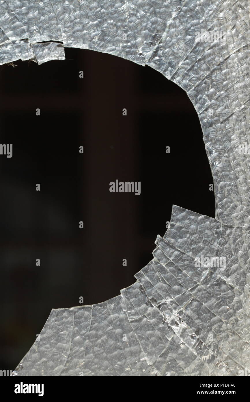 Fragmented glass, old broken window Stock Photo - Alamy