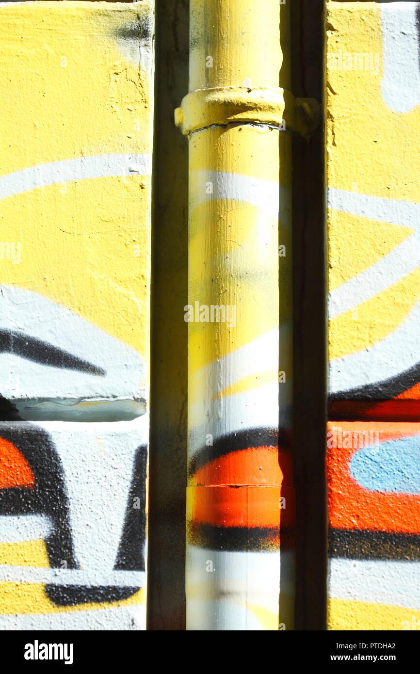 old yellow metal water pipe Stock Photo - Alamy