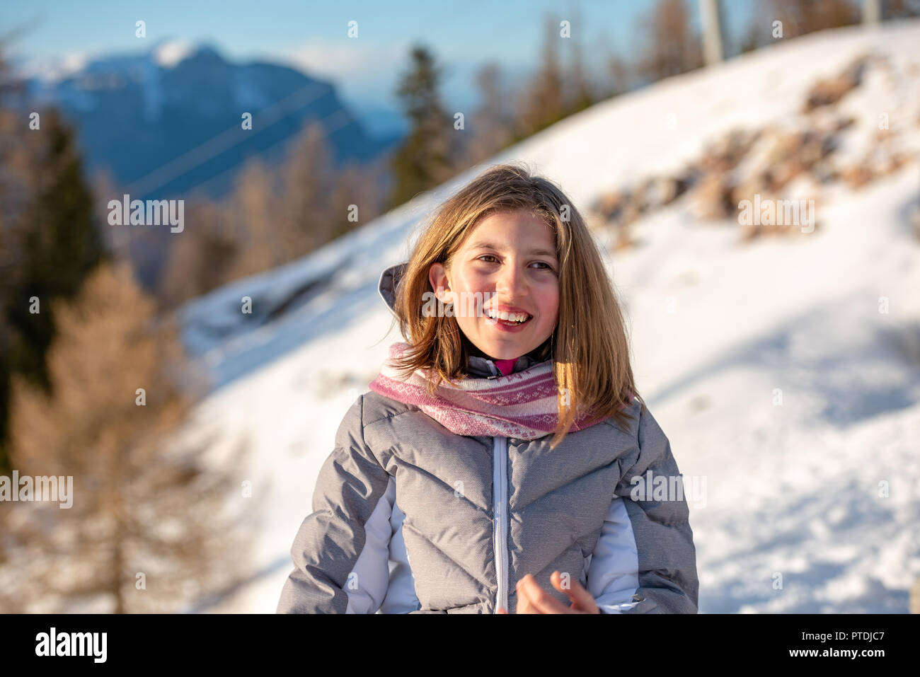 Cute baby girl with winter clothes on the snow Stock Photo - Alamy