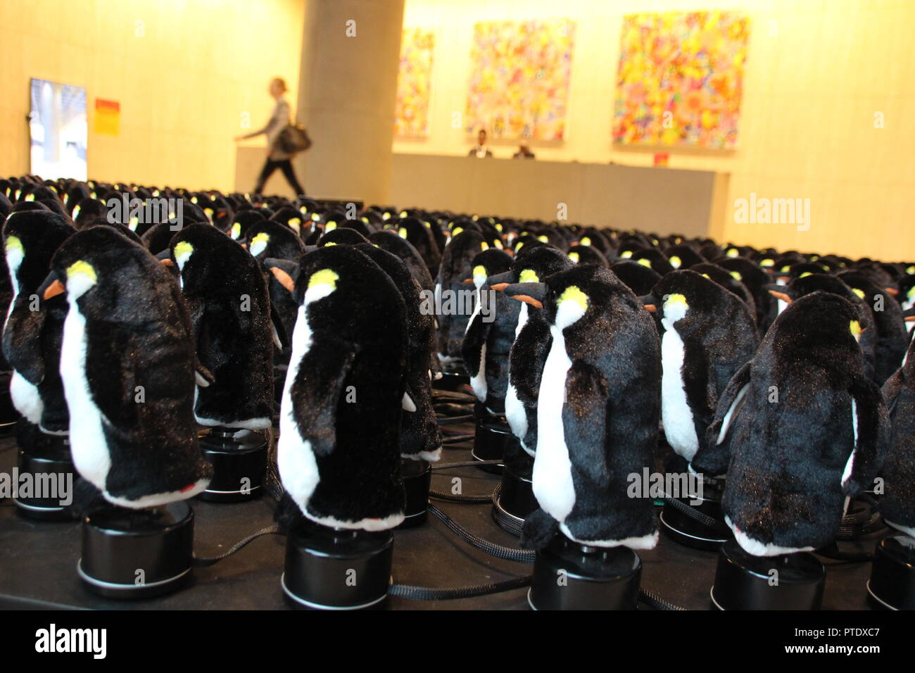 New York, USA. 08th Oct, 2018. Visitors walk past the installation ...