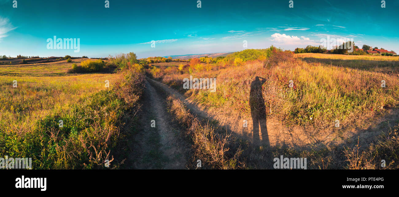 Shadow of photographer photographing autumn nature landscape Stock ...