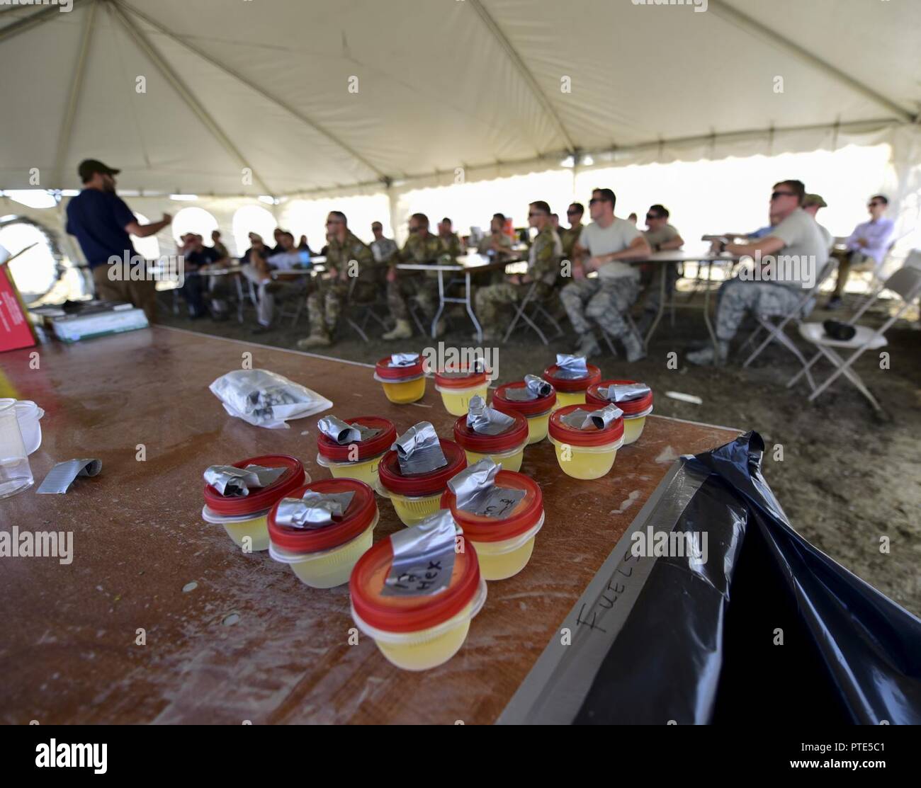 Homemade explosives sit on a table as an FBI Special Agent Bomb ...
