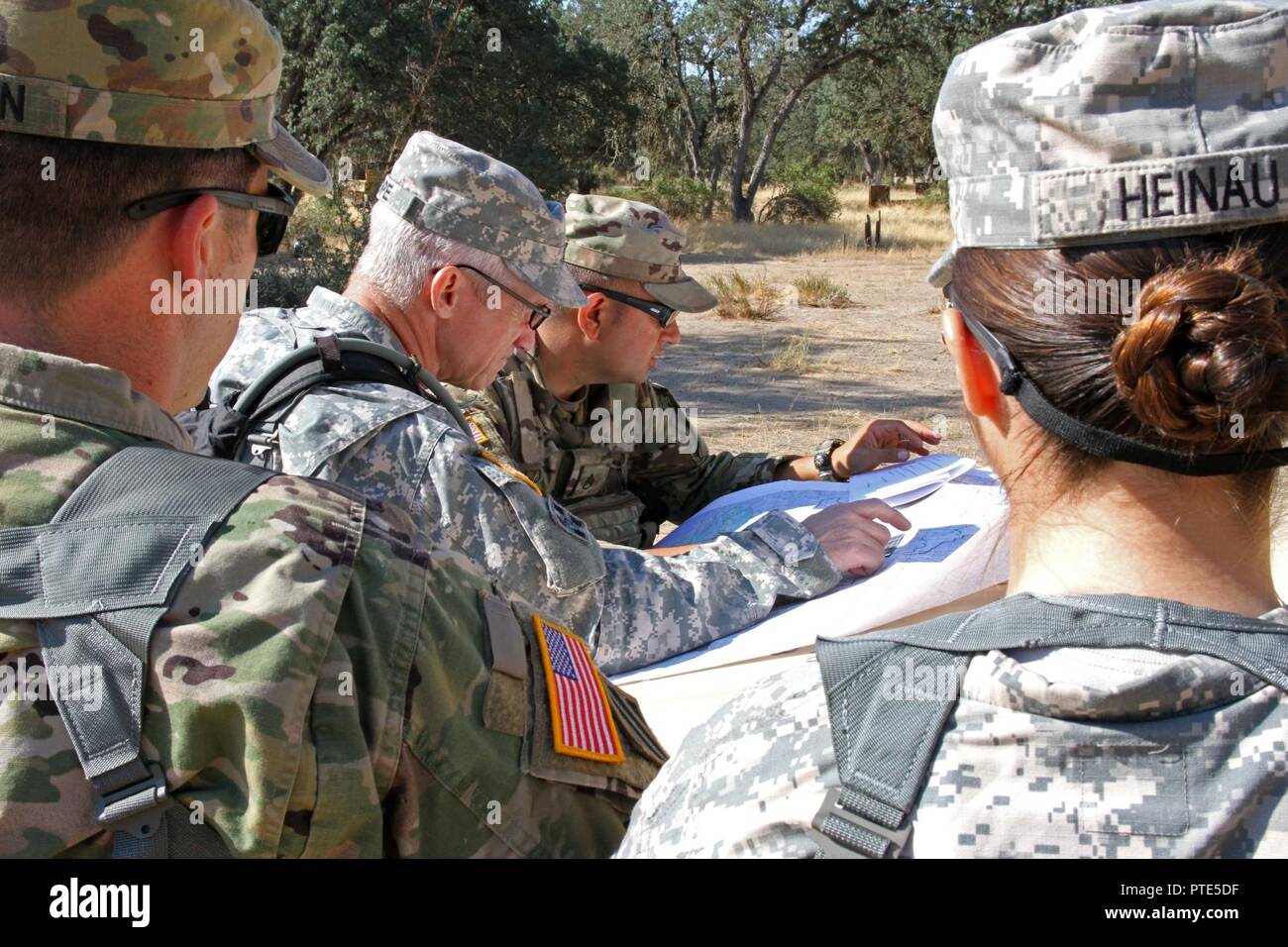 Staff Sgt. Horacio Morfin, middle right, an operations sergeant with ...