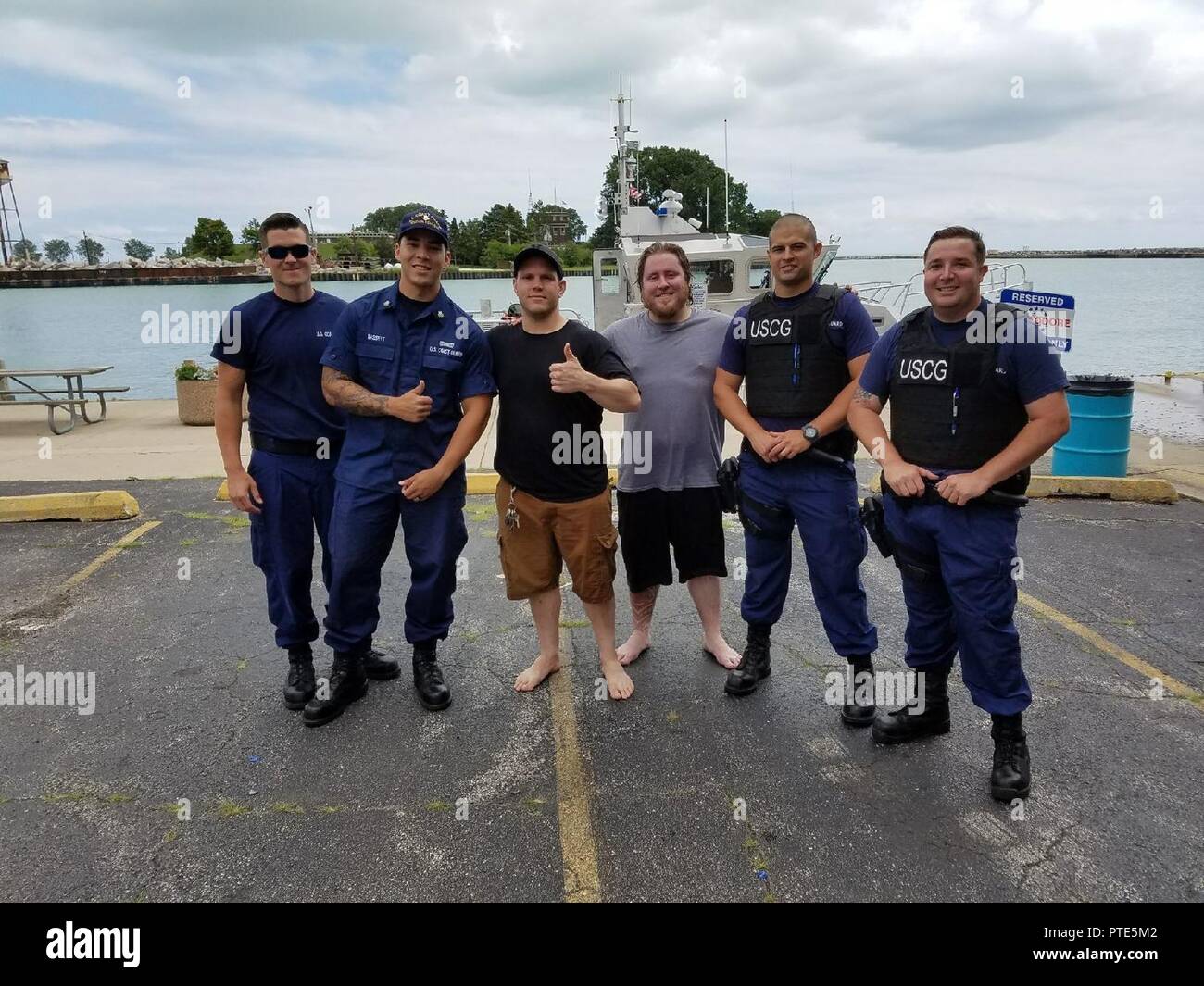 Boat crew members from Coast Guard Station Kenosha pose with the two ...