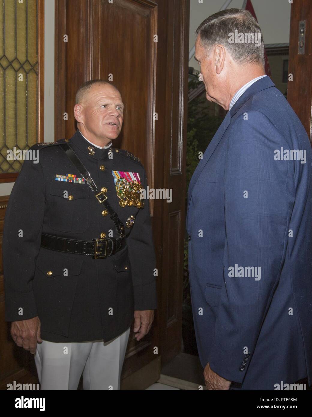 Commandant of the Marine Corps Gen. Robert B. Neller, left, speaks with ...