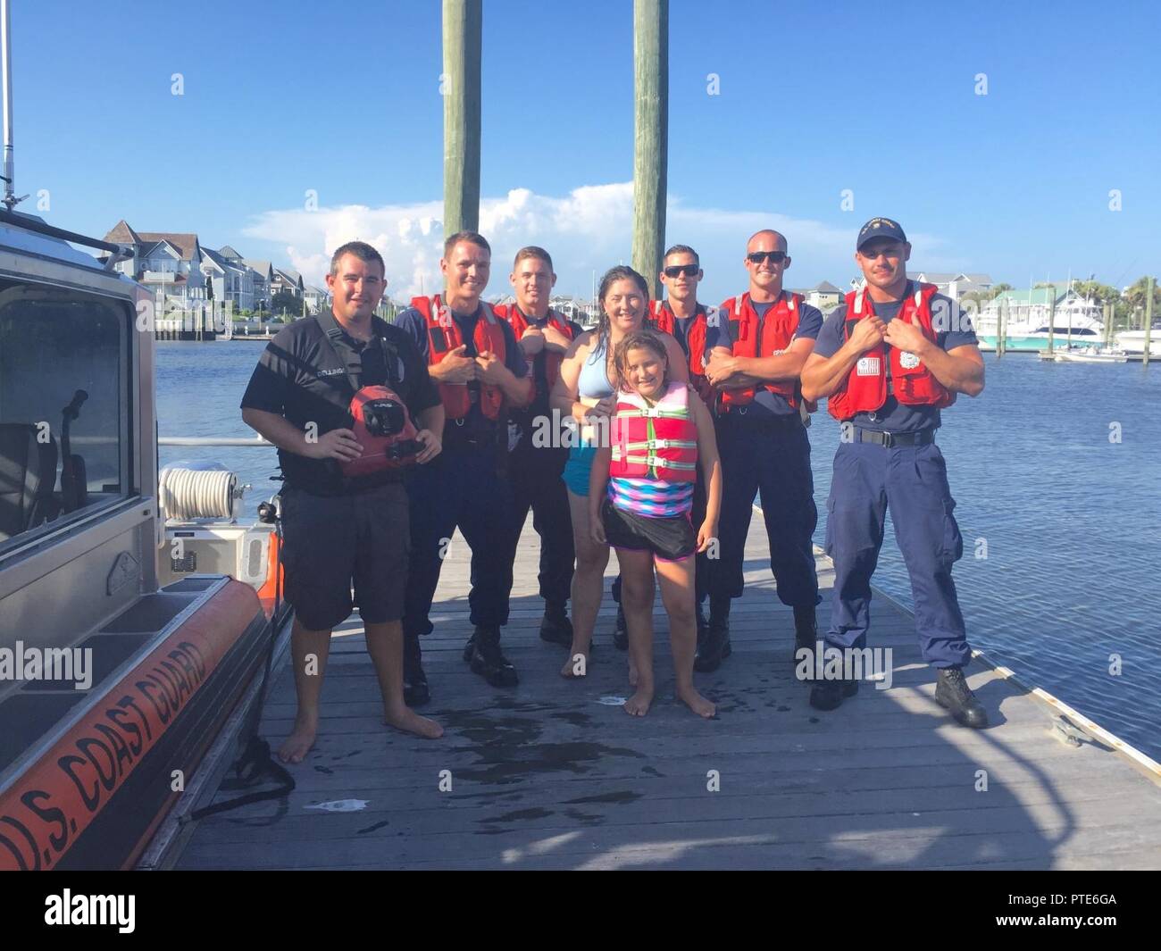 A Coast Guard Response Boat-Small crew from Station Oak Island stands ...