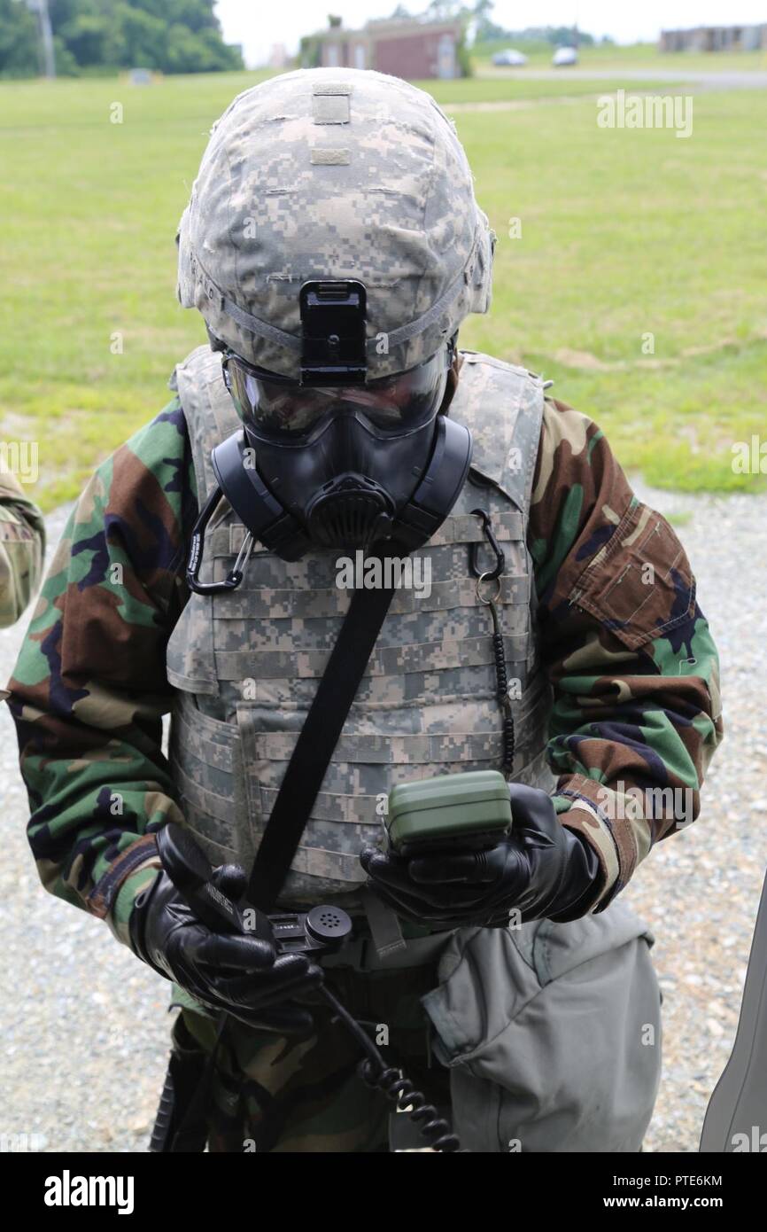 U.S. Army Sgt. Andrew Roland, 71st Ordnance Group (EOD), calls for a 9 ...