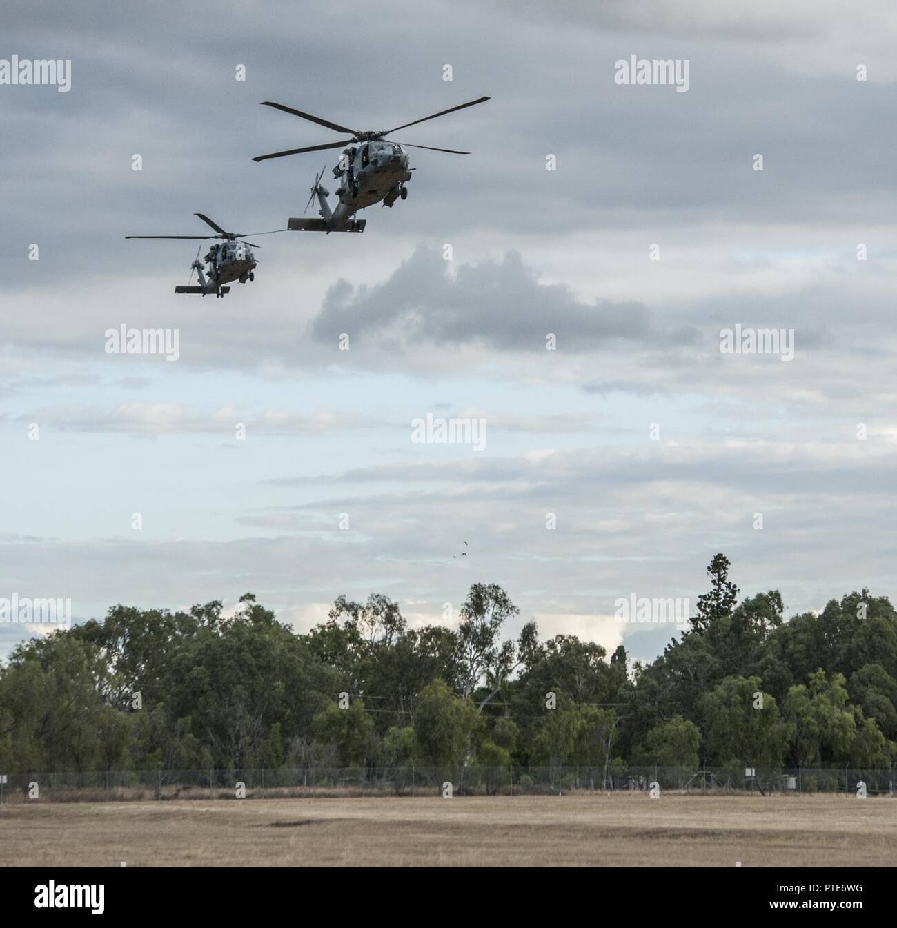 Two U.S. Navy HH-60H Sea Hawk helicopters assigned to Helicopter Sea ...