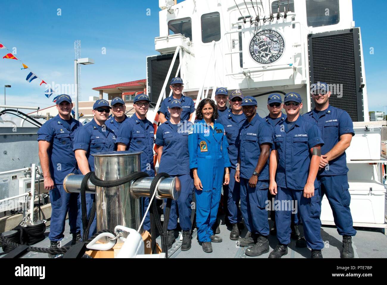 The crew of the Coast Guard Cutter Manowar share a moment with American ...