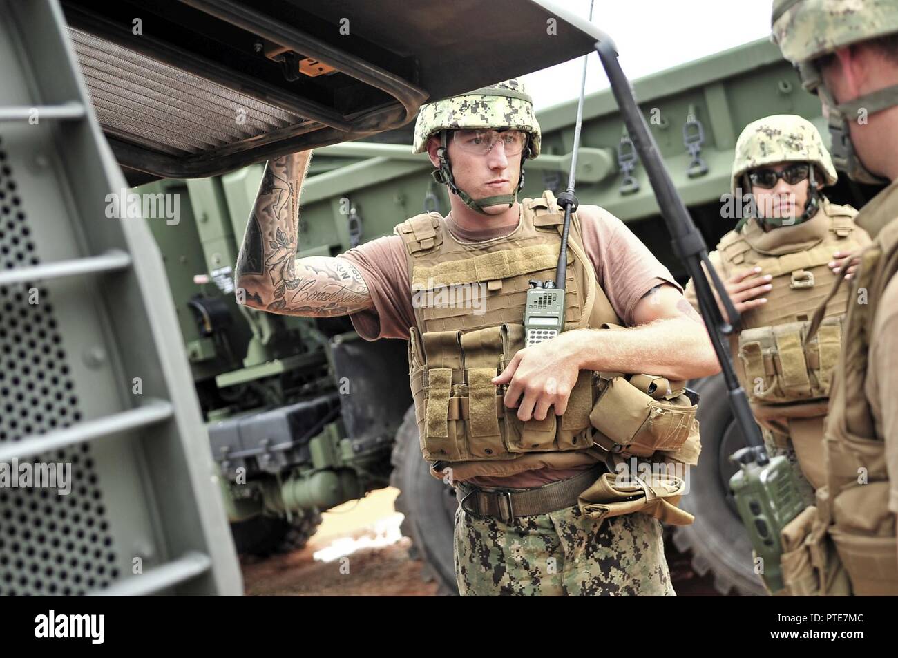 Seabees assigned to Naval Mobile Construction Battalion (NMCB) 11 ...