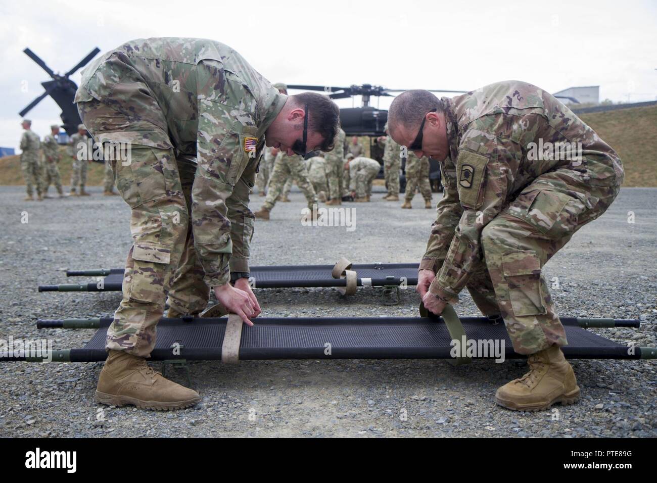 Sgt. Noah Hughes (left), medic with 421st Multifunctional Medical ...