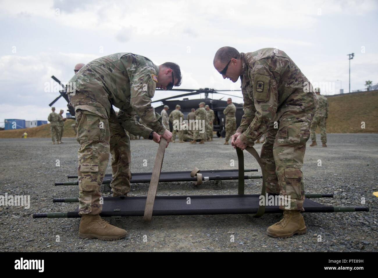 Sgt. Noah Hughes (left), medic with 421st Multifunctional Medical ...