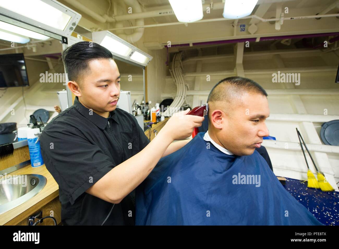 PACIFIC OCEAN (July 15, 2017) Ship’s Serviceman Seaman John Calazan, a ...
