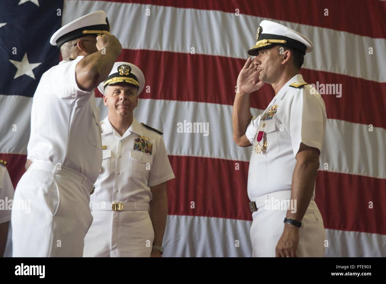 NORFOLK (July 14, 2017) Sailors parade the colors in the hangar bay of ...