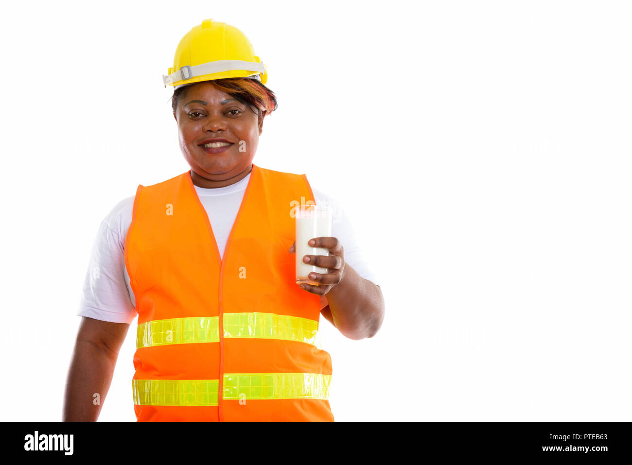 Studio shot of happy fat black African woman construction worker Stock ...