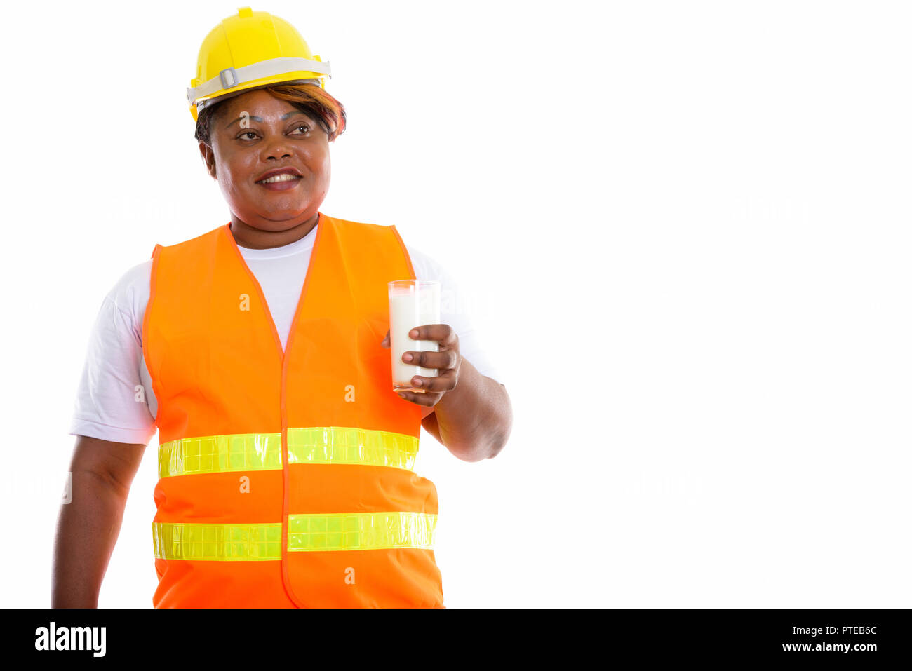 Studio shot of happy fat black African woman construction worker Stock ...