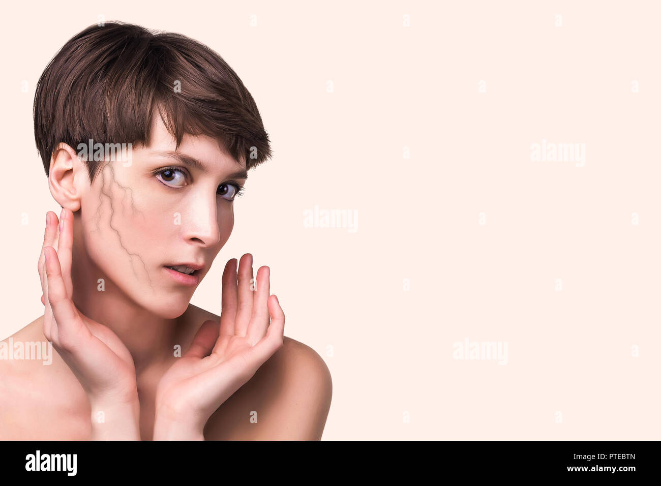 Woman face covered with cracked earth texture- symbol of dry skin Stock ...
