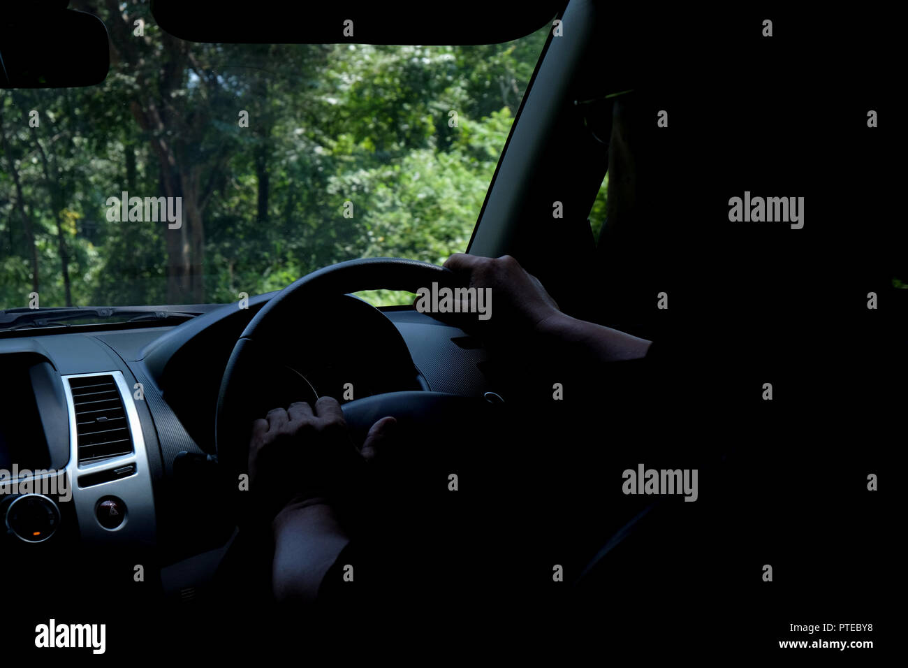 image of people driving car on day time Stock Photo - Alamy