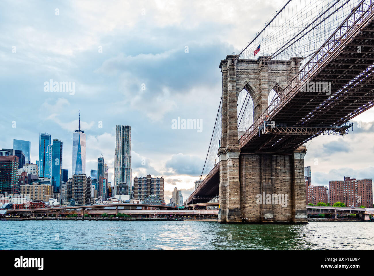 Skyline of Downtown of New York and Brooklyn Bridge from East River at ...