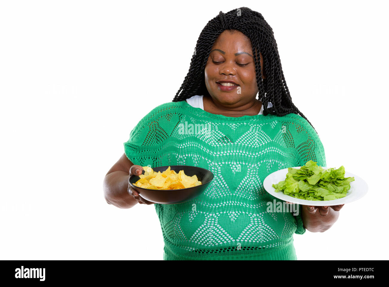 Portrait happy fat woman choosing hi-res stock photography and images ...