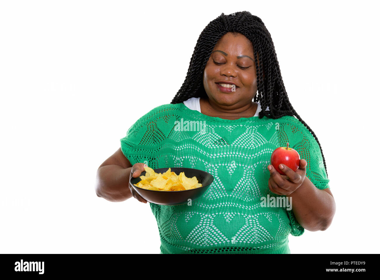 Portrait happy fat woman choosing hi-res stock photography and images ...