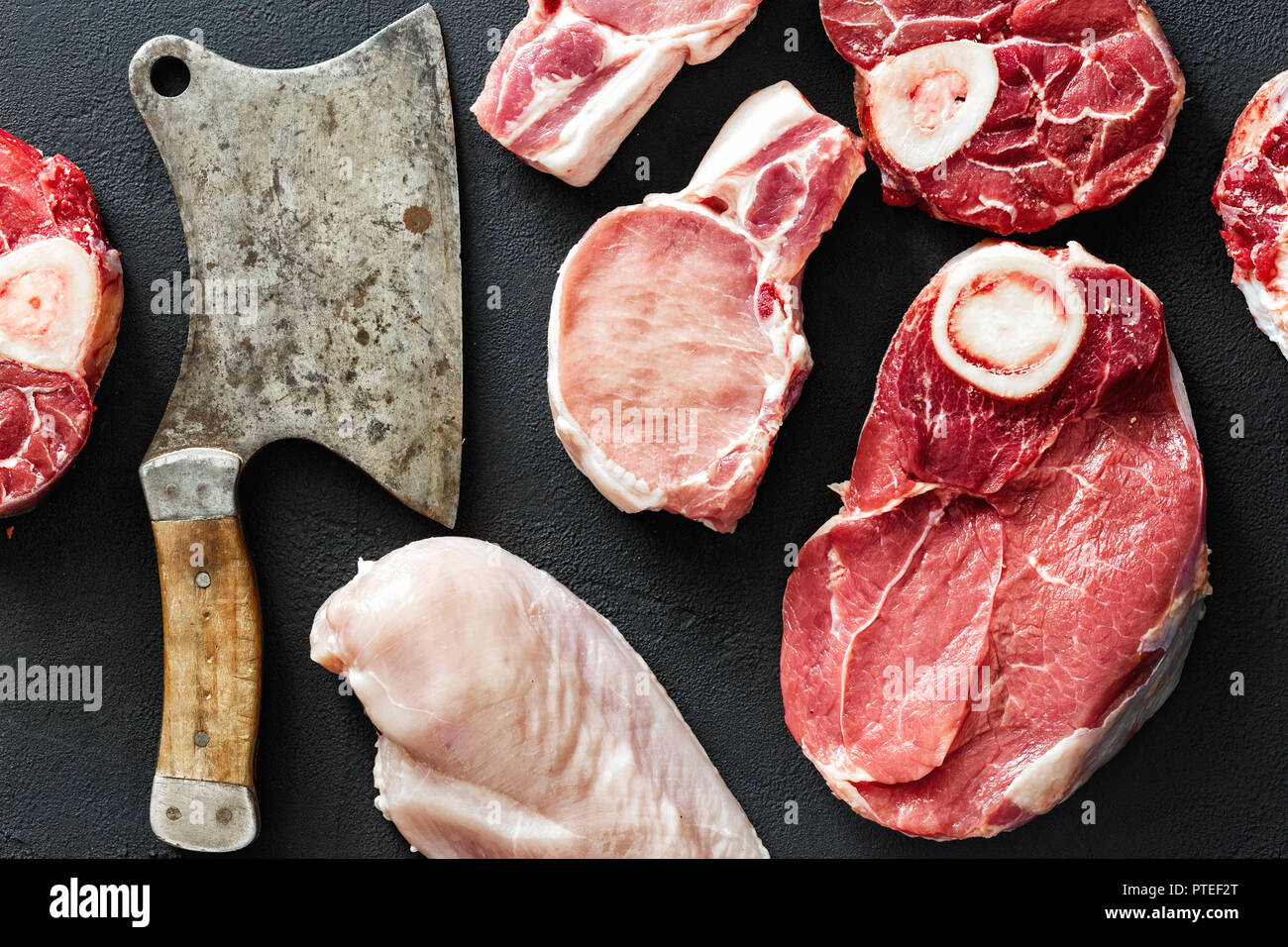 Set different meats (pork, chicken fillet, beef) with old vintage ...