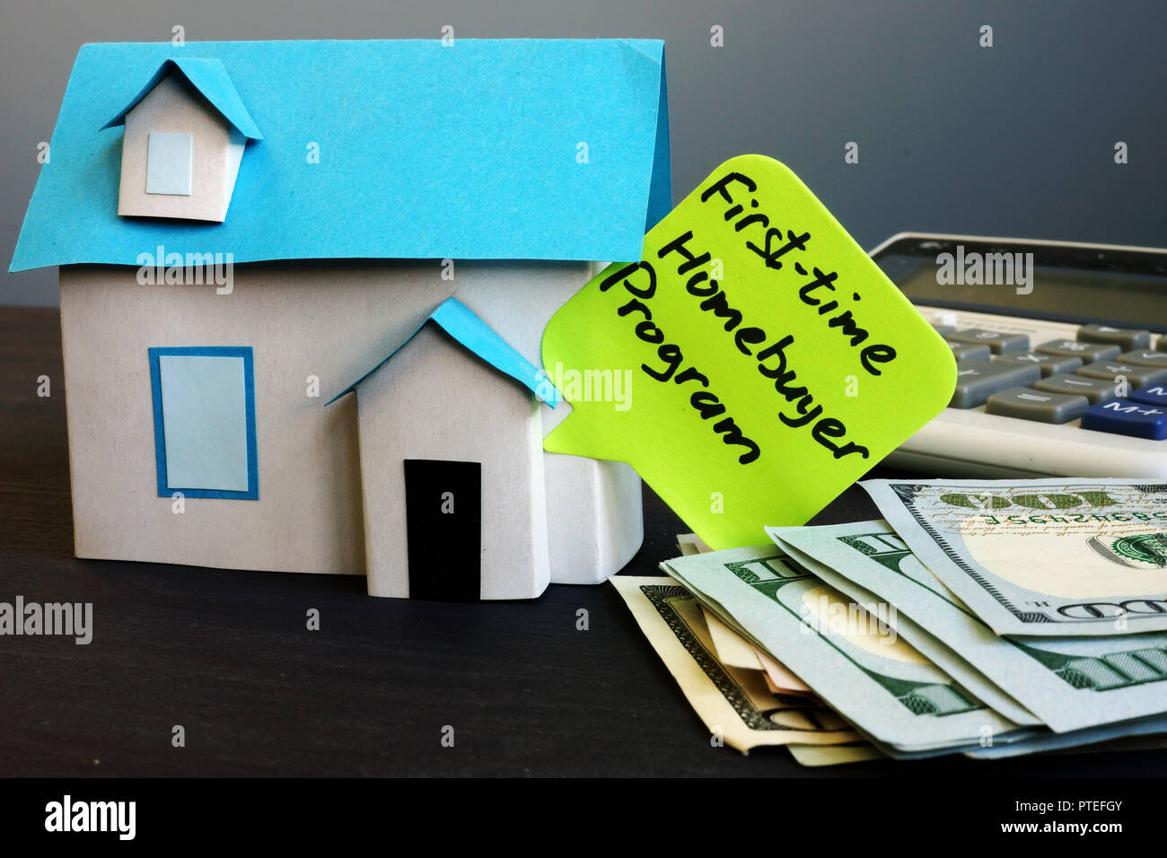 First time homebuyer program and model of house Stock Photo - Alamy