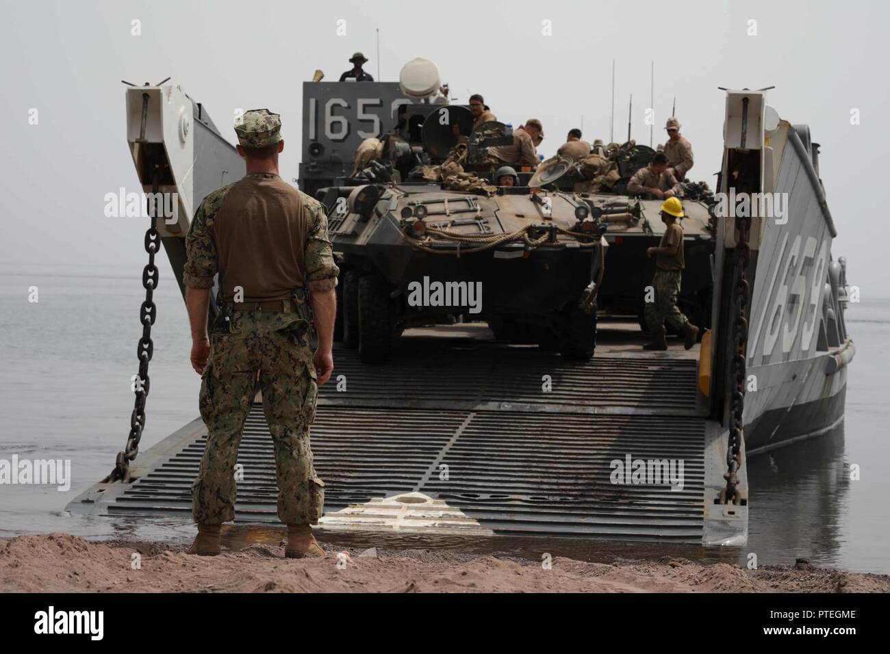 BEACH, Djibouti (July 11, 2017) Sailors assigned to Beach Master Unit ...