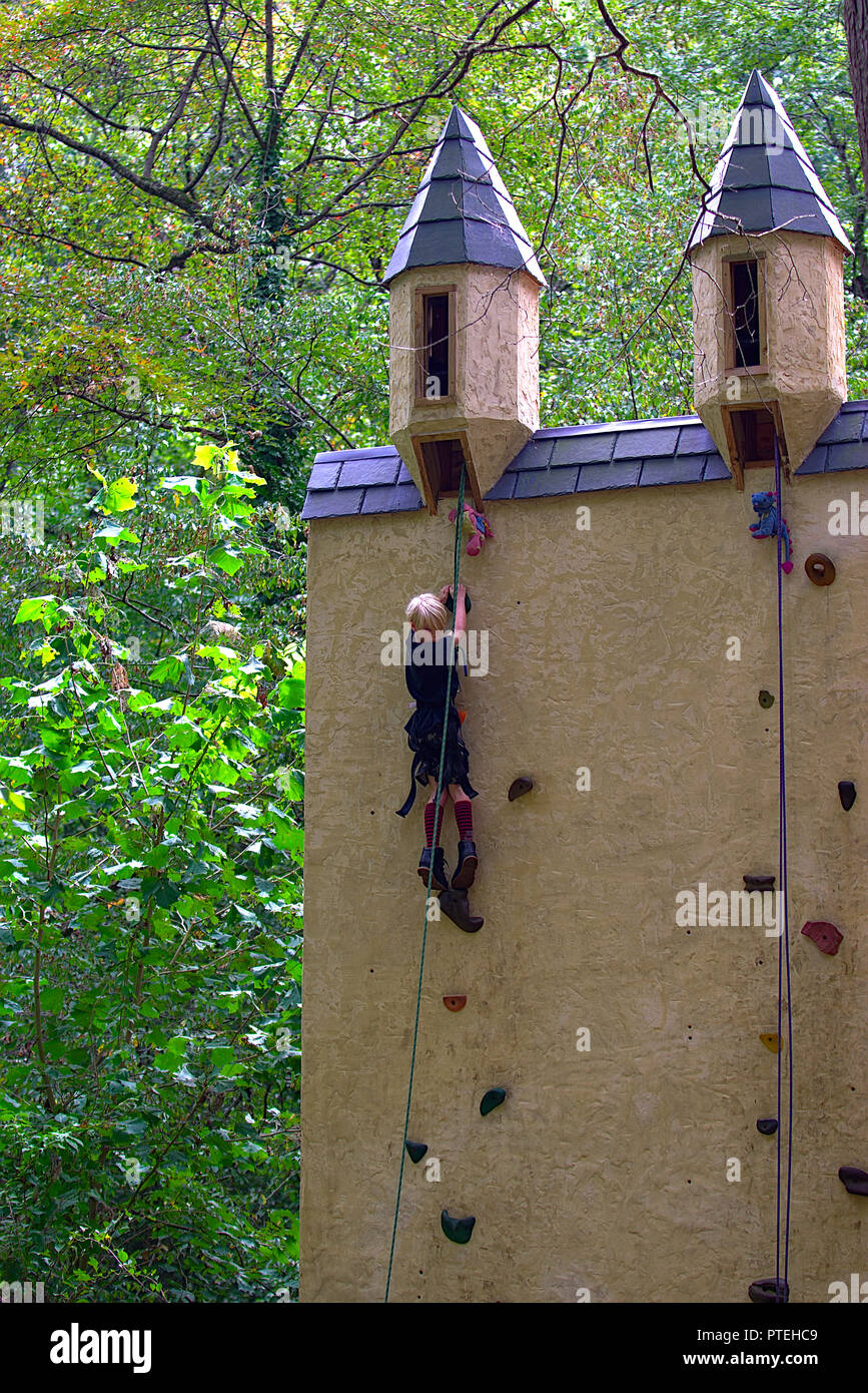 Kid climbing castle wall at Renaissance festival in Annapolis MD Stock ...