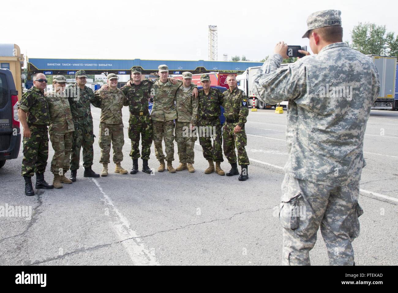 Bulgarian and Romanian Civil Military Cooperation partners pose with ...