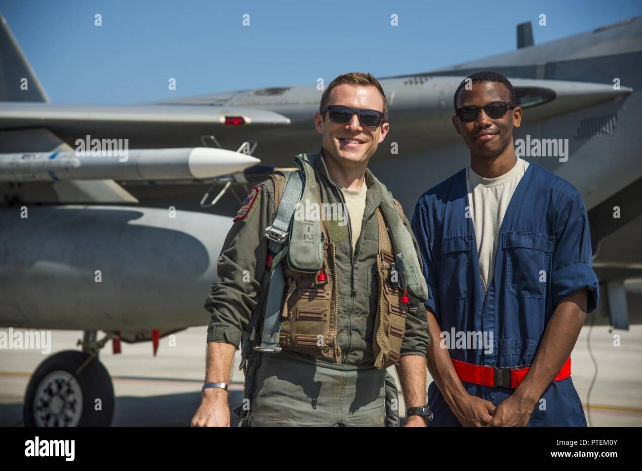 U.S. Air Force Capt. David Kuhn, left, a 67th Fighter Squadron F-15C ...