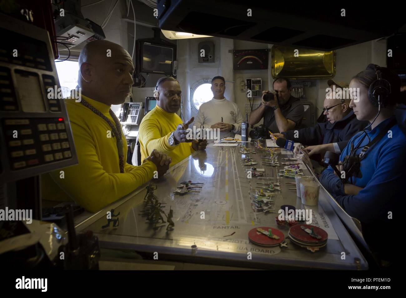 United States Navy handler Lieutenant Commander Terrance Flournay ...