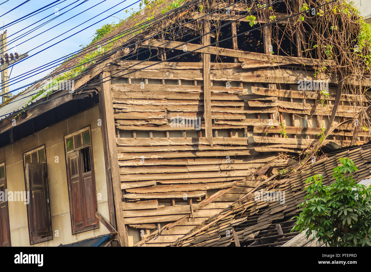 Abandoned houses with damage roof and wall. Grungy wooden house that ...
