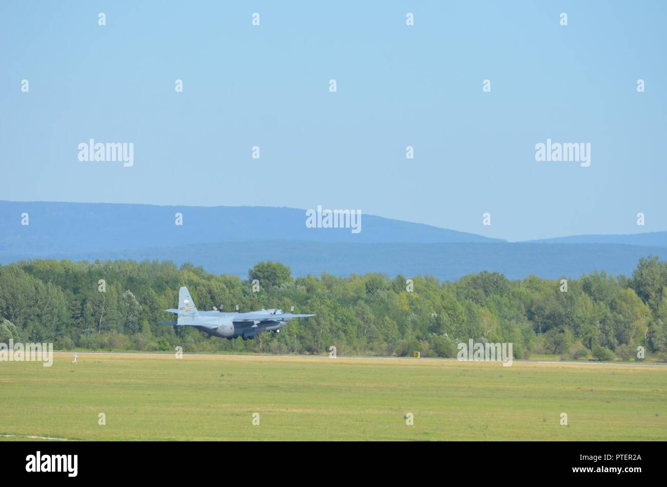 PAPA AIR BASE, Hungary — One by one, eight C-130 Hercules airplanes ...