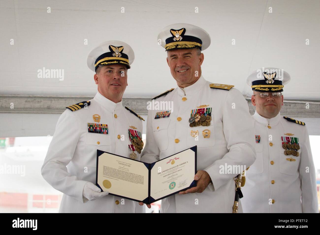 From left to right, Coast Guard Cmdr. John D. Cole, Vice Adm. Karl L ...