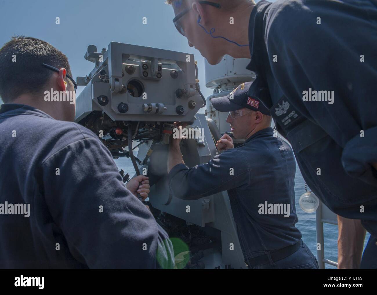 ATLANTIC OCEAN (July 19, 2017) Sailors perform maintenance on an MK-38 ...