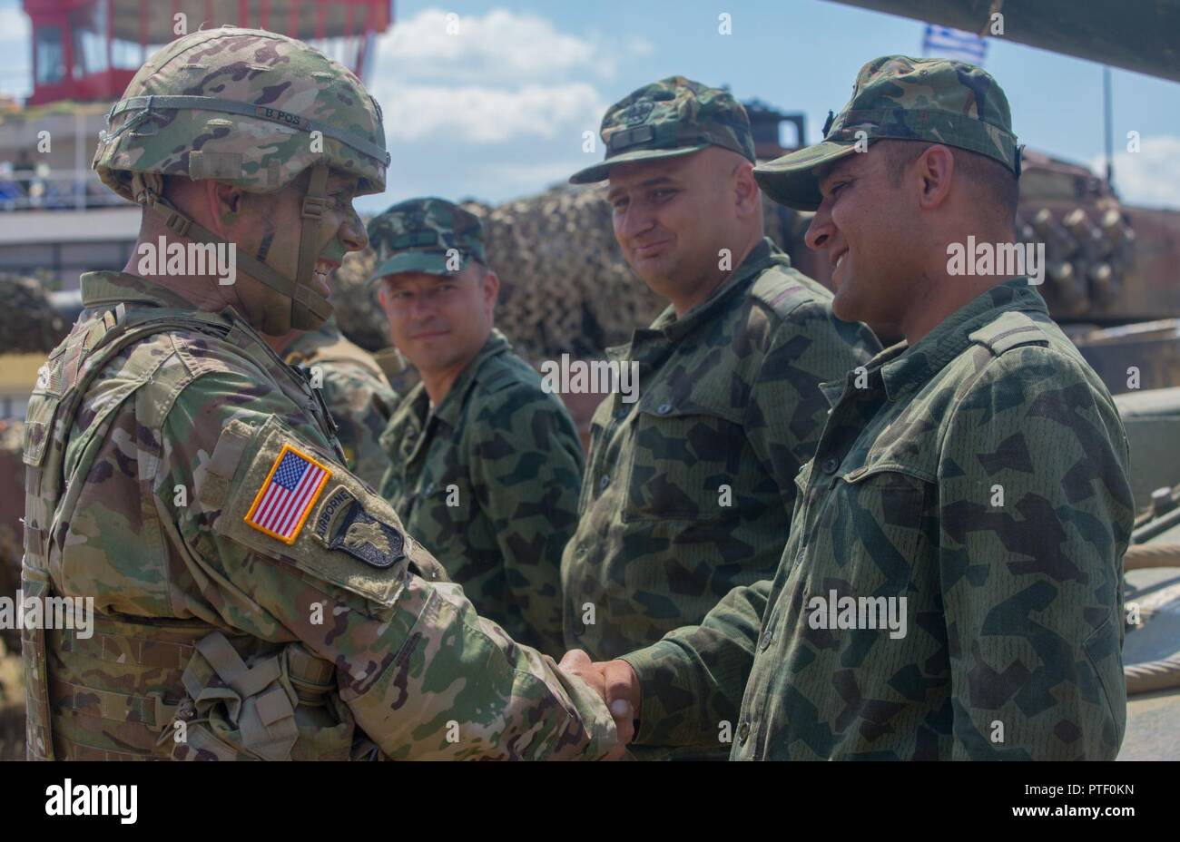 Lt. Gen. Ben Hodges, commander, U.S. Army Europe, shakes hands with a ...