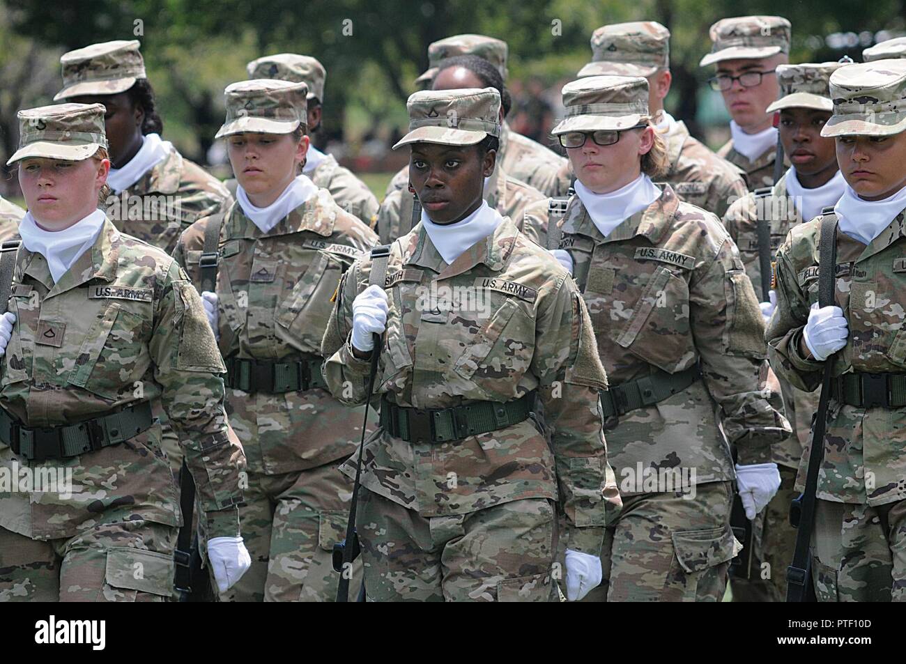 The 244th Quartermaster Battalion team performs marching movements ...