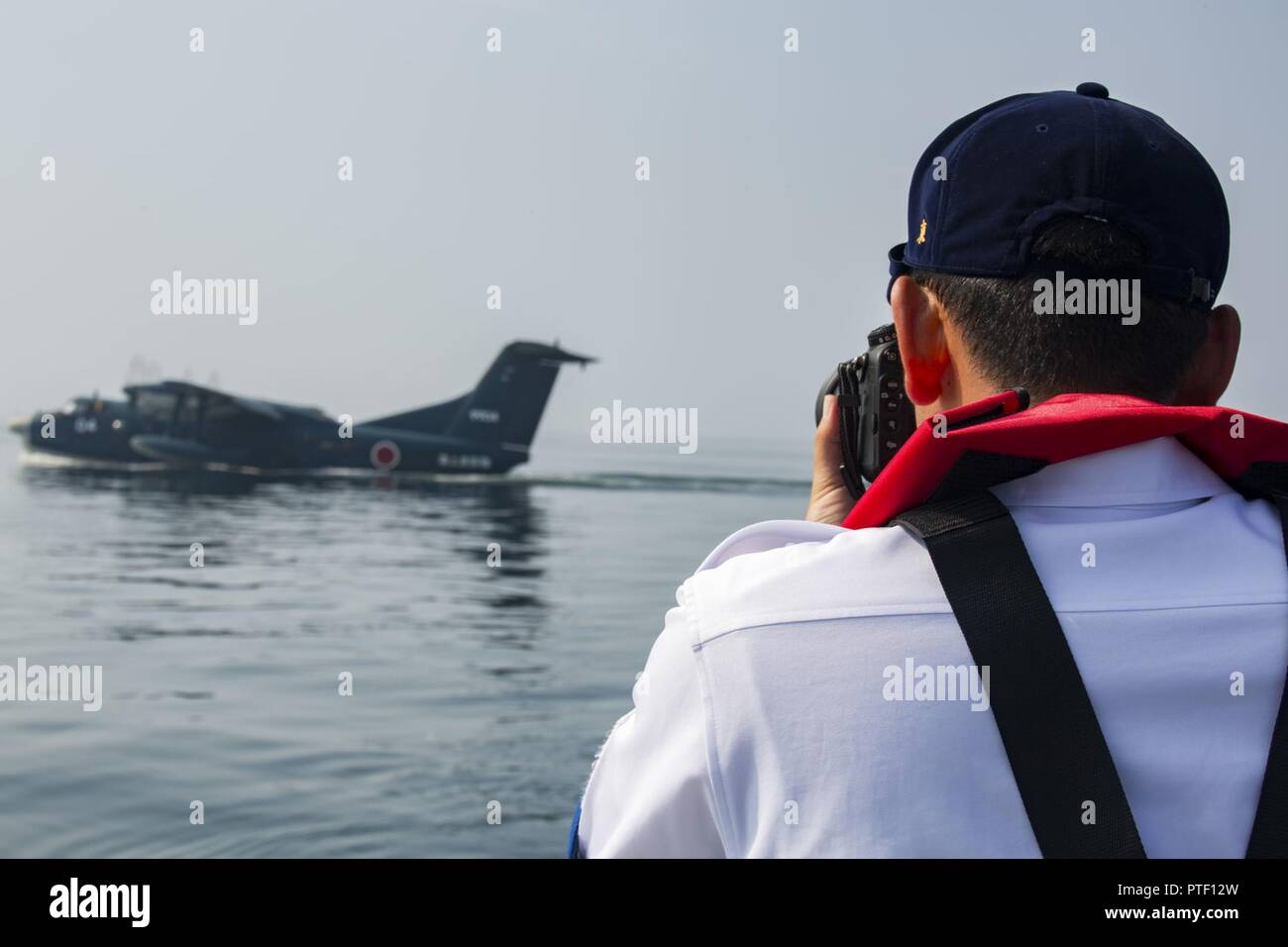 Japan Martime Self-Defense Force (JMSDF) personnel conduct water ...